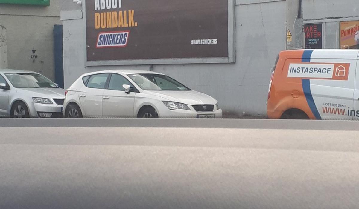 Cork fan bemused by Dundalk supporting Snickers billboard outside ...