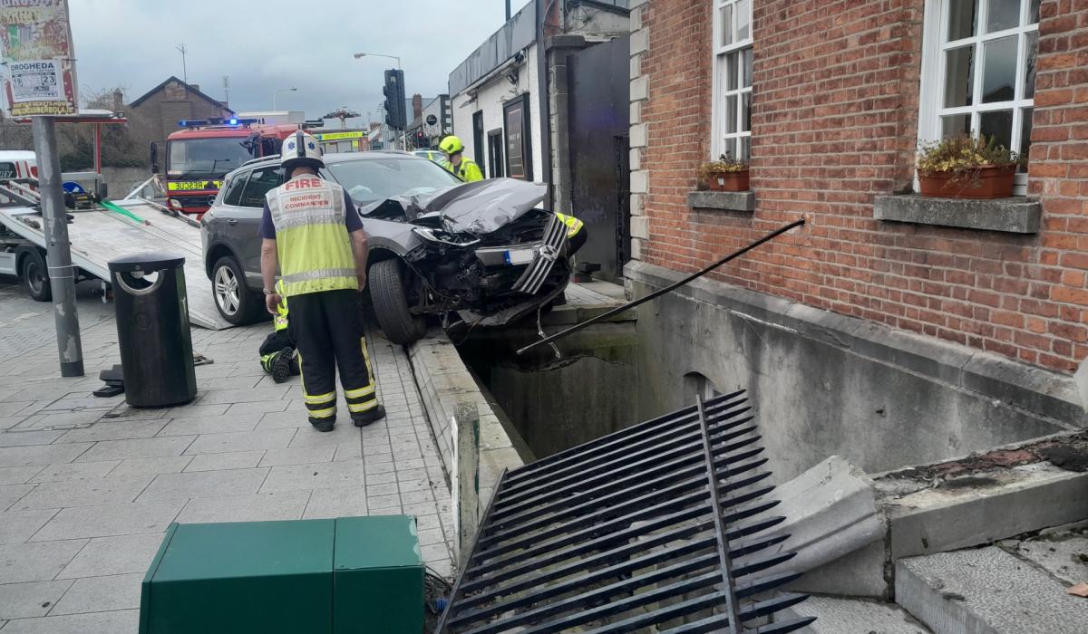Car left dangling over 12-foot drop in Louth after dramatic crash ...